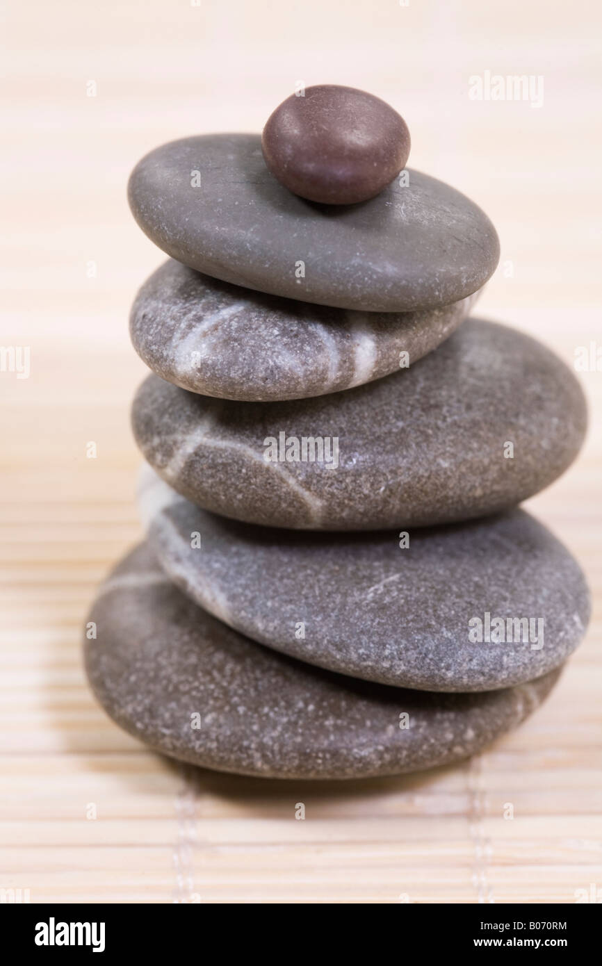 Balancing flat stones Stock Photo - Alamy