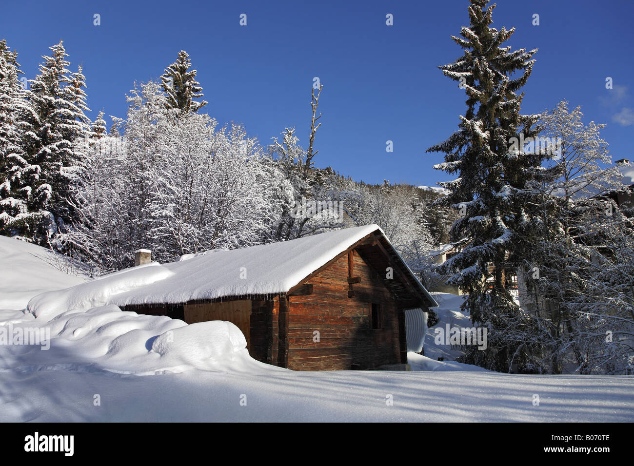 snow-covered hut in Switzerland Stock Photo - Alamy