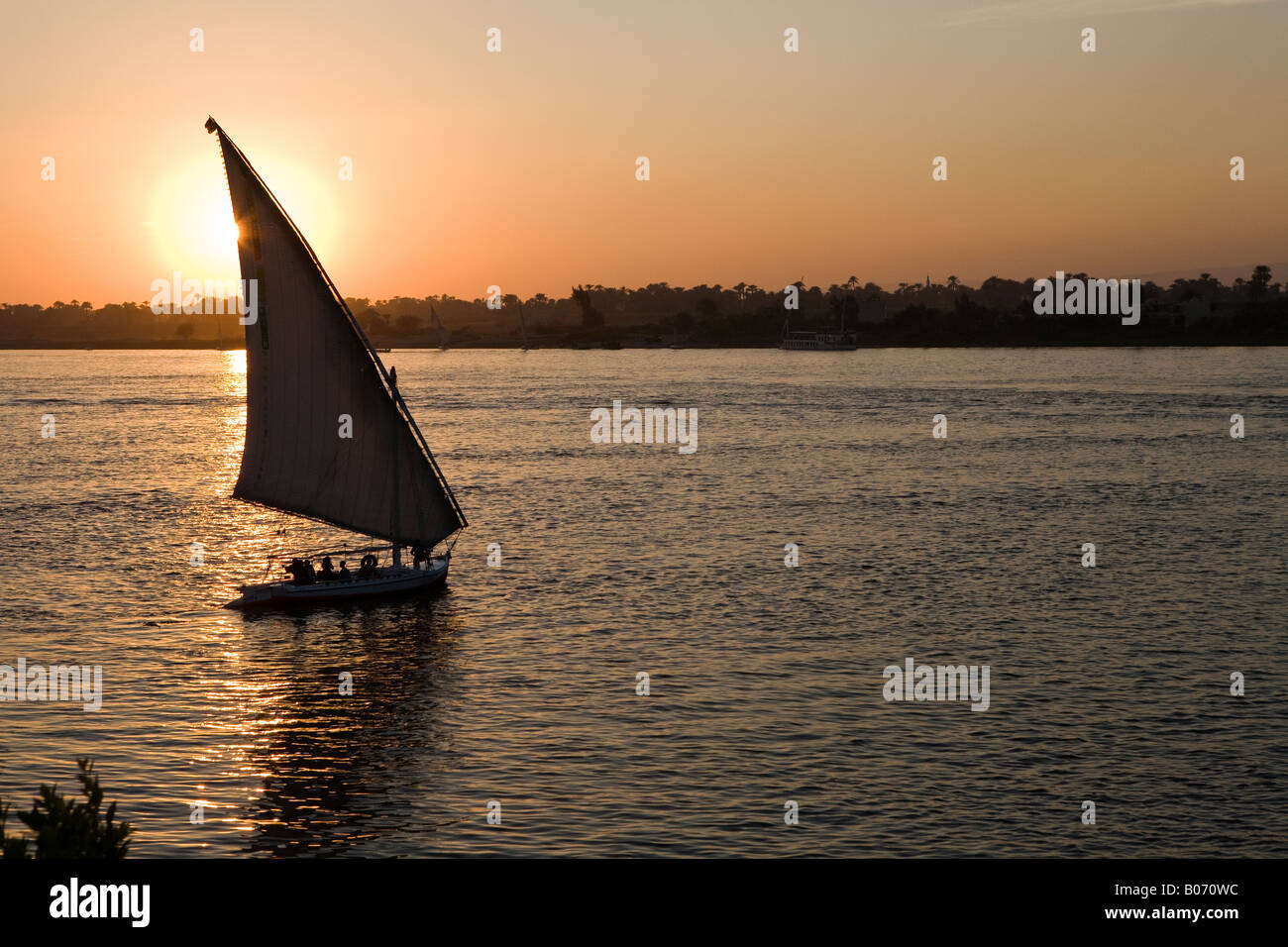 Felucca sailing on the Nile at sunset, Luxor, Egypt, north Africa Stock ...