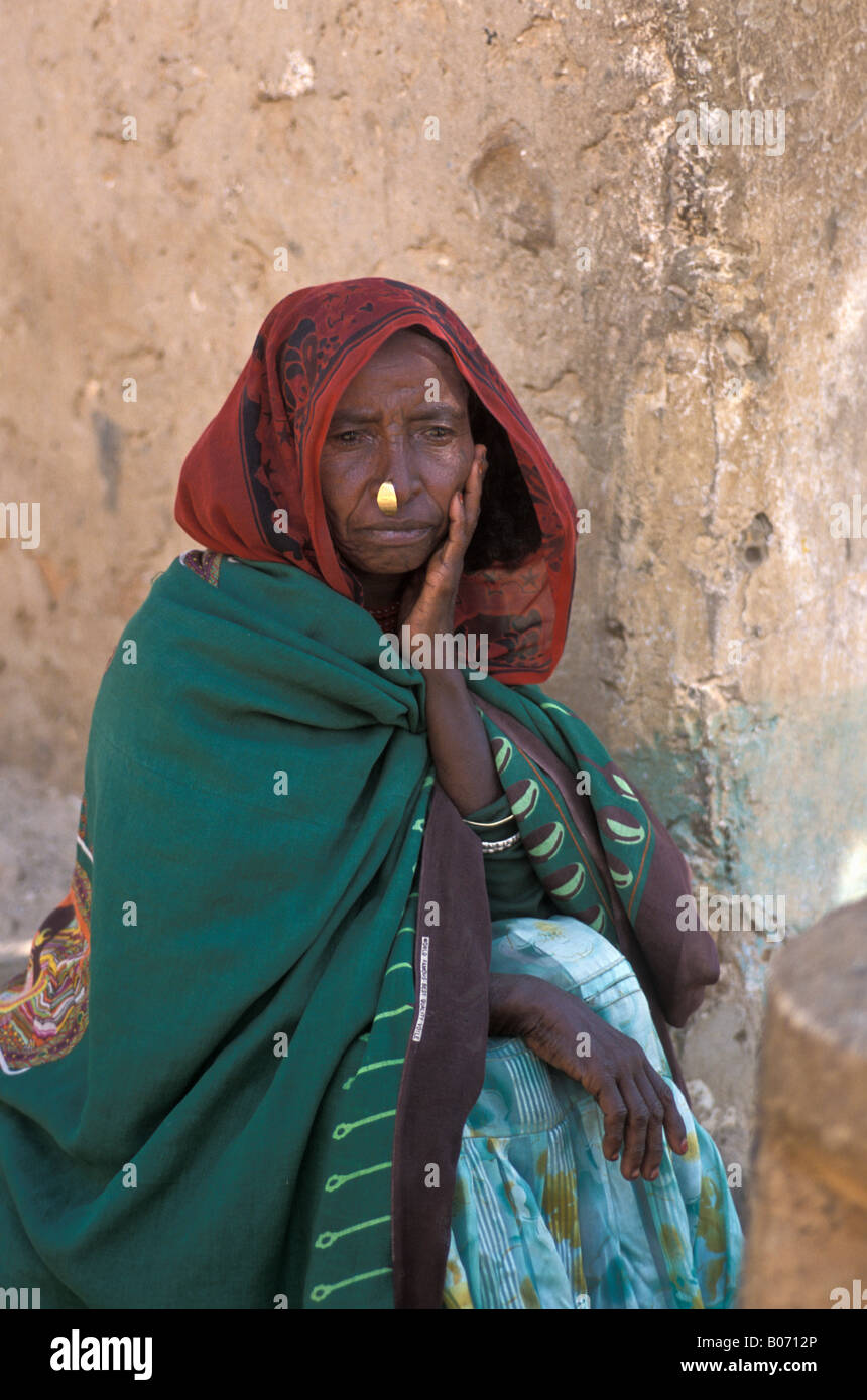 Tigray woman or Eritrean woman in shawl with nose ring depressed after ...