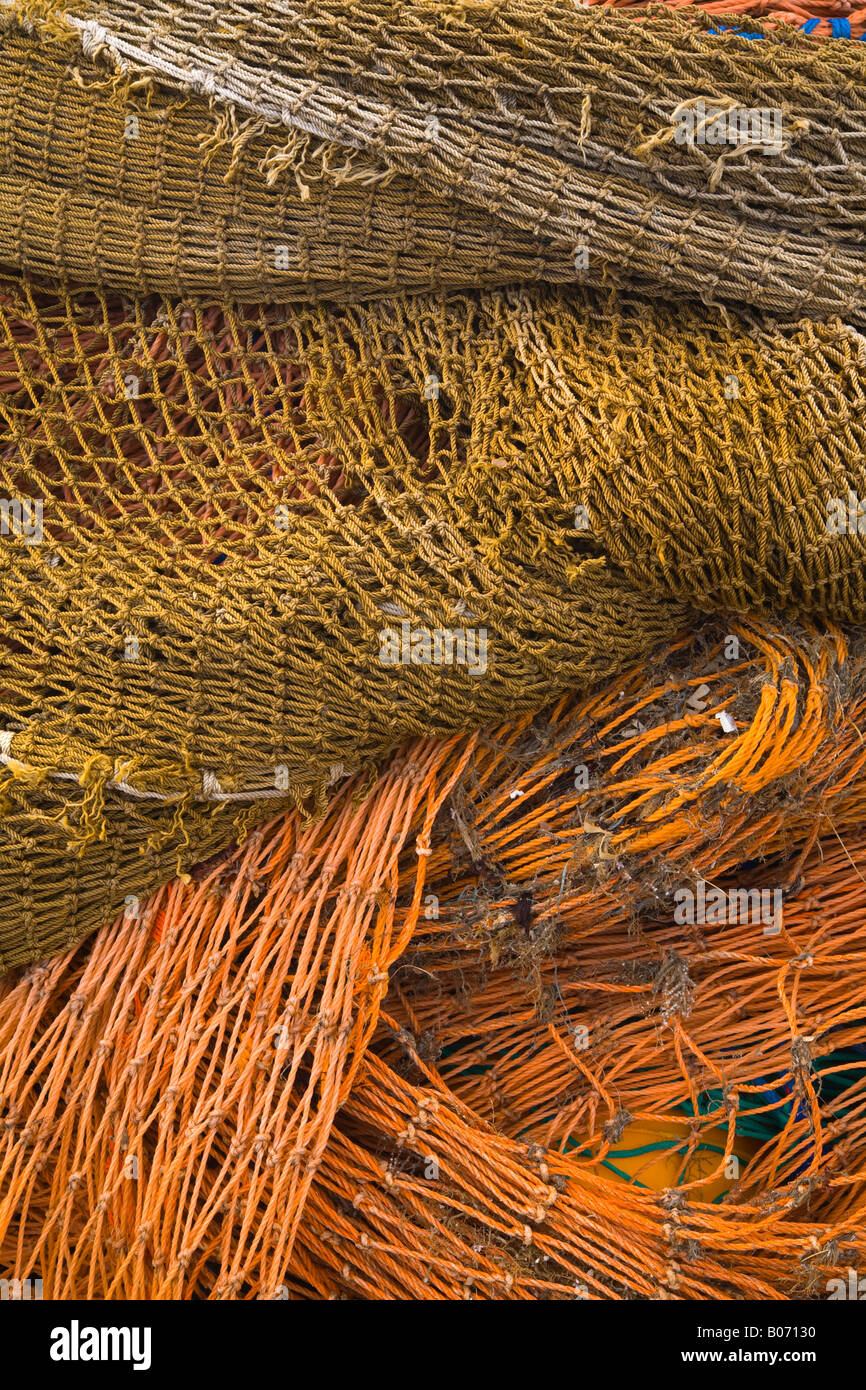 Scotland Scottish Borders Eyemouth Entwined fishing nets stored in the ...
