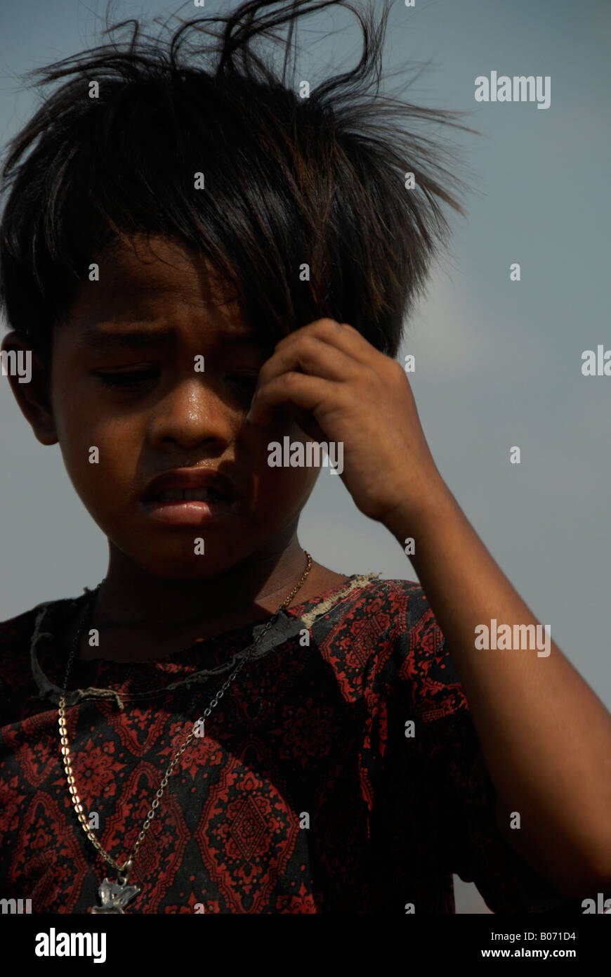 squatter boy from the rubbish dump in phnom penh, he lives around the ...
