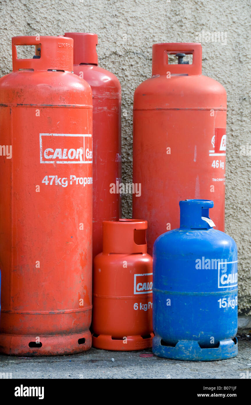 Blue Butane and orange propane Calor Gas cylinders awaiting collection ...