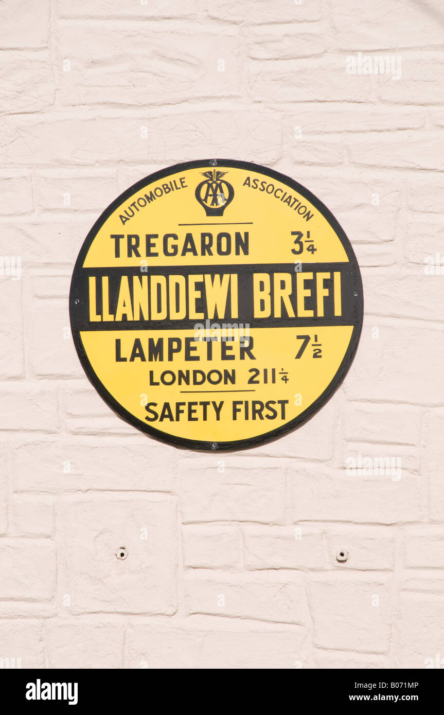 Old yellow and black circular AA Automobile Association sign in ...