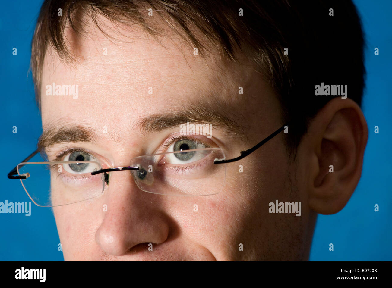 Young man making faces Stock Photo - Alamy