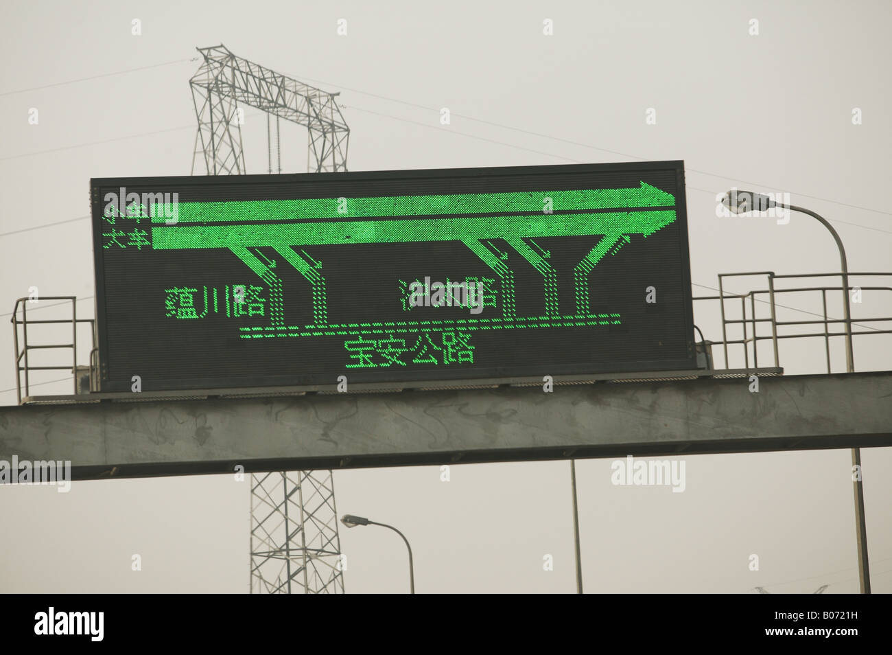 Chinese neon road sign Stock Photo - Alamy