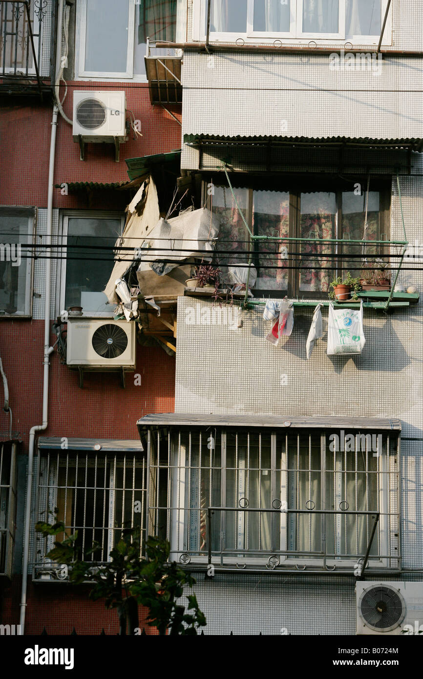Chinese tower block in Shanghai with washing line hanging outside the ...