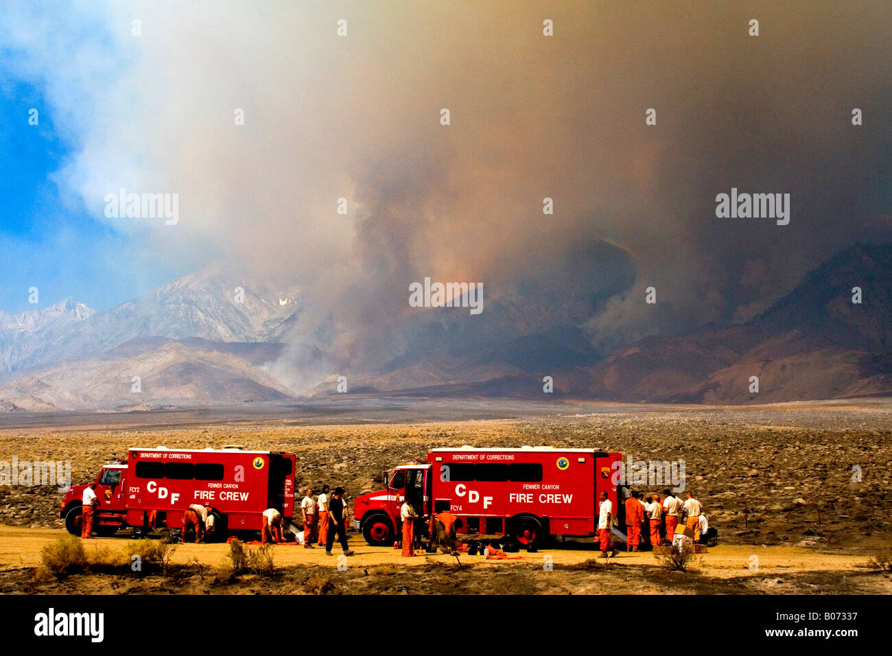 Fire crew after massive forest fire on Hwy 395 on the eastern side of ...