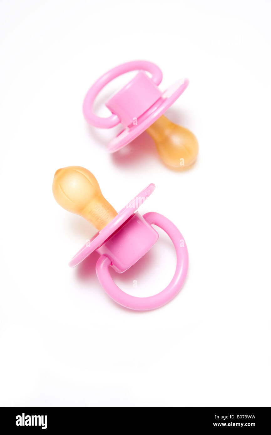 Babies dummies or pacifiers isolated on a white studio background Stock ...