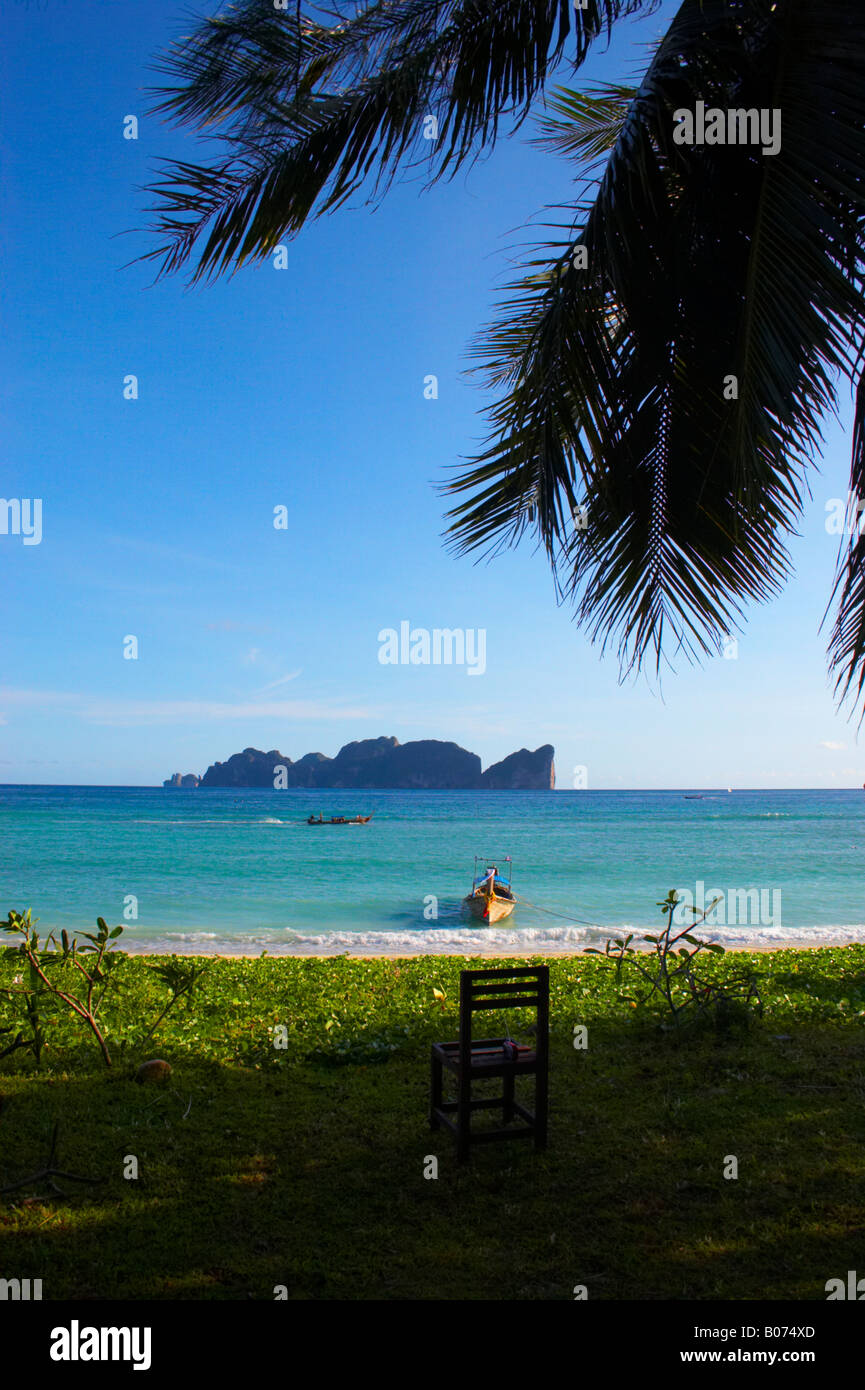 Idyllic tropical island beach scene at sunset sea view vertical Stock ...