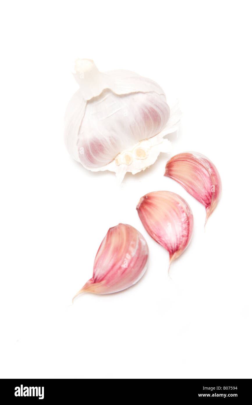 Garlic isolated on a white studio background Stock Photo - Alamy