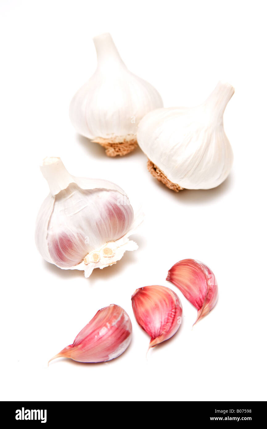 Garlic isolated on a white studio background Stock Photo - Alamy