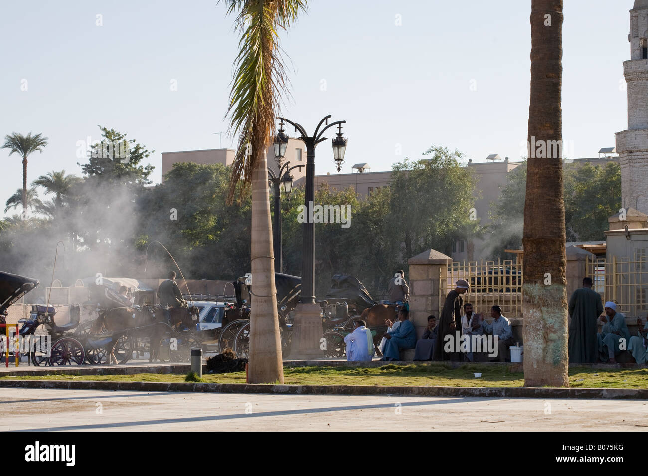 Street scene in Luxor City Egypt. Cars and pedestrians in the road ...