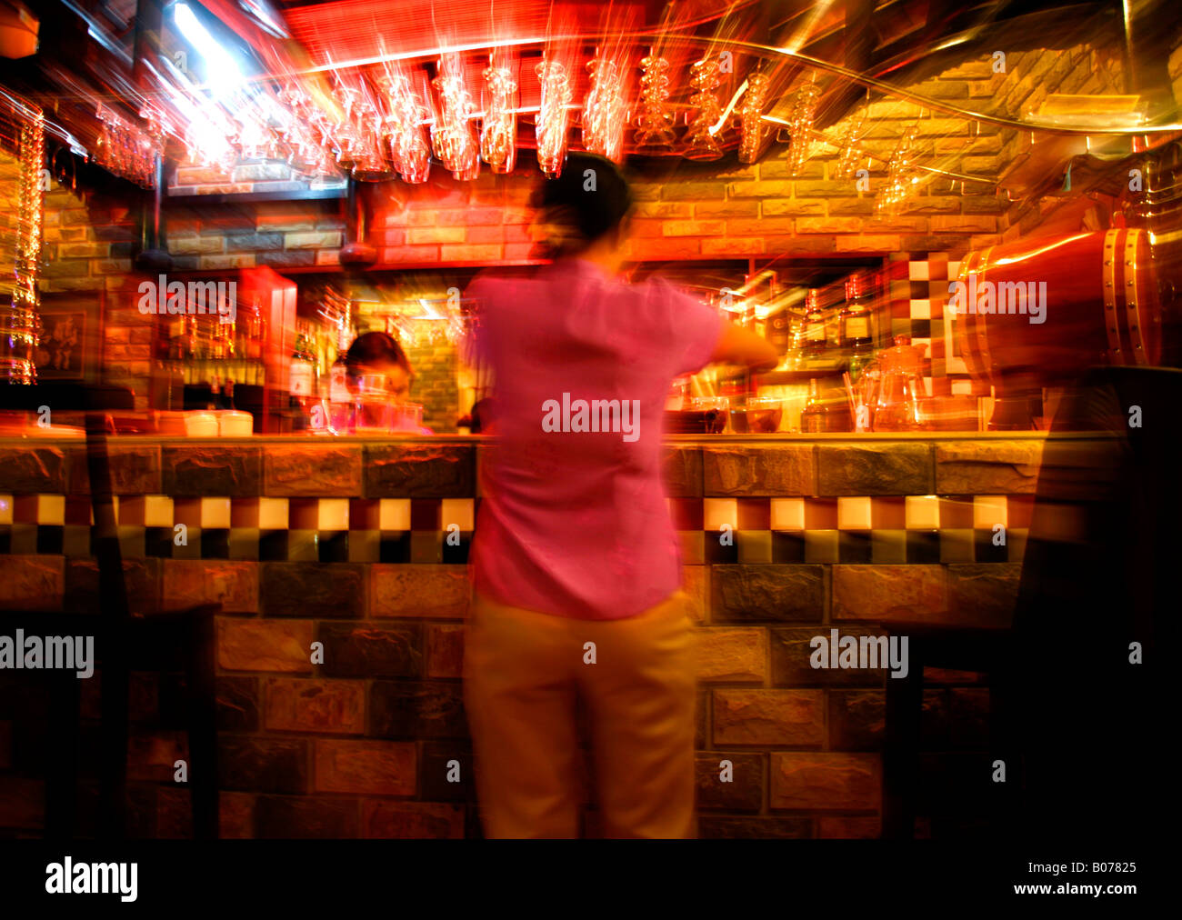 working in a bar Stock Photo - Alamy