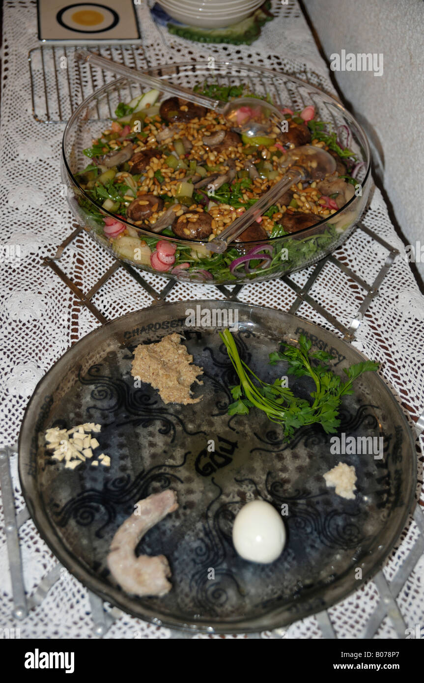 Seder Plate on a table set for a Jewish Festive meal on Passover Stock ...