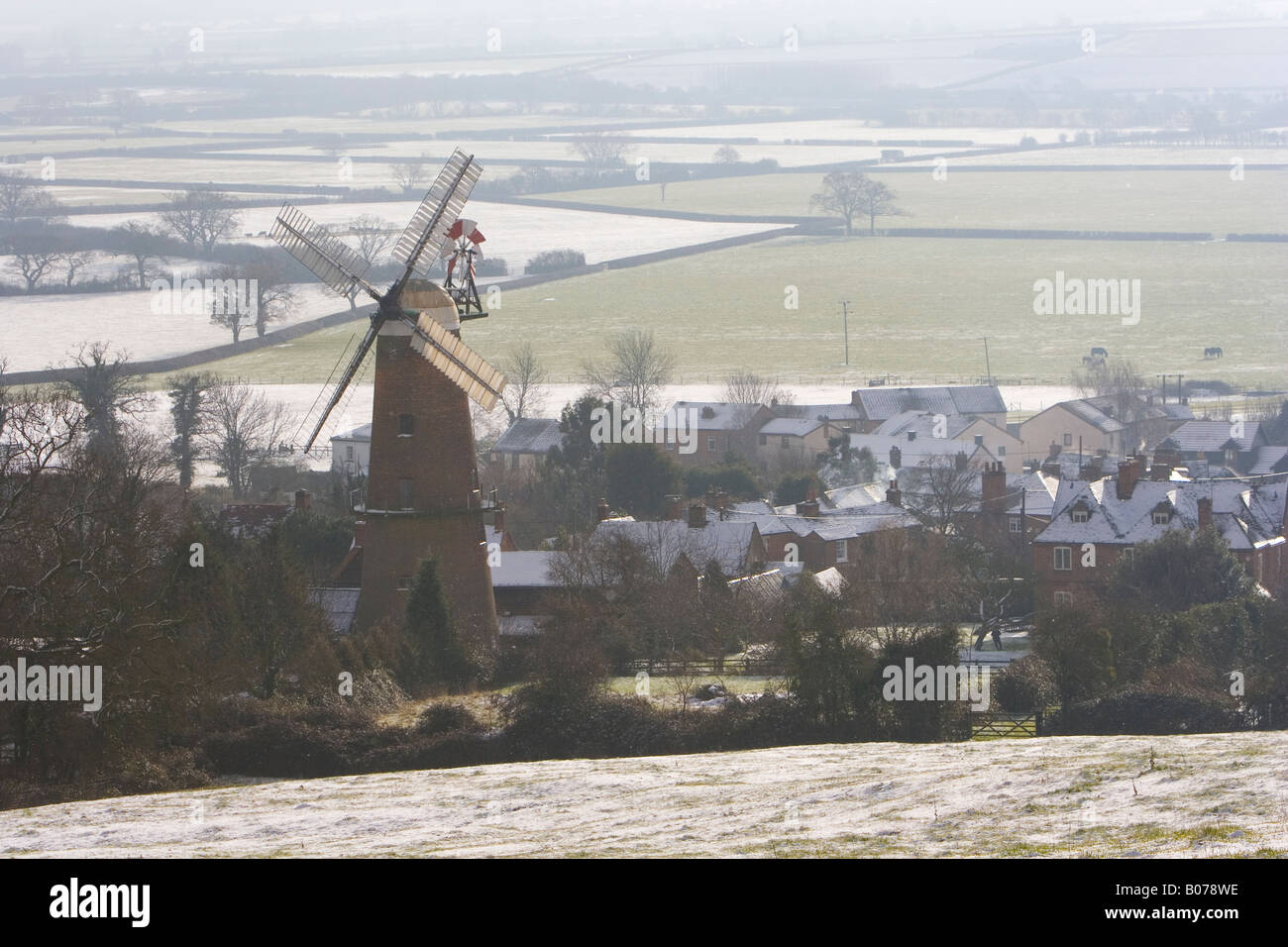 Quainton windmill in snowfall, Bucks, England Stock Photo - Alamy
