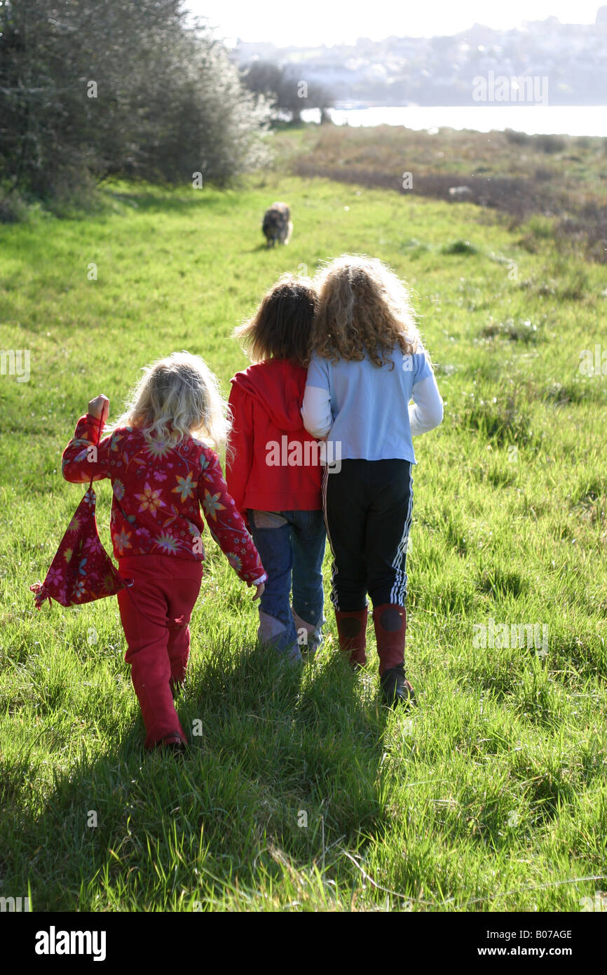 Group of children walking Devon Stock Photo - Alamy