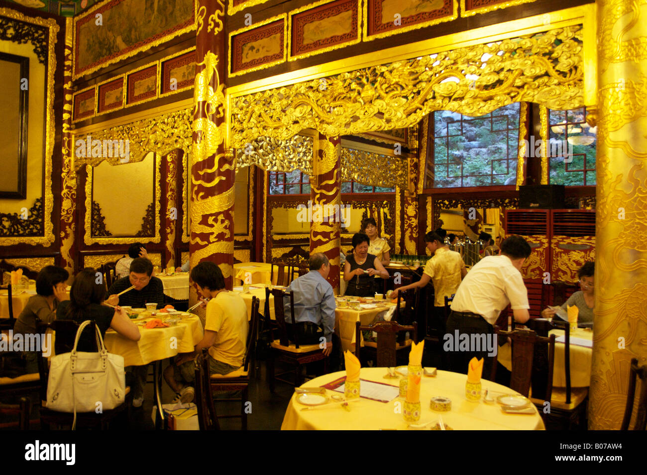 The tables inside the Fang Shan restaurant which originally served food ...