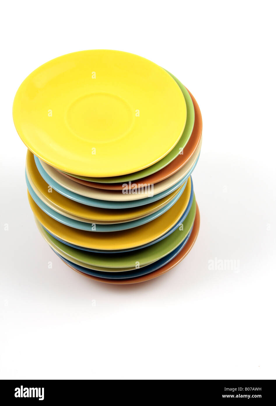 Colored plates isolated on white background Stock Photo - Alamy