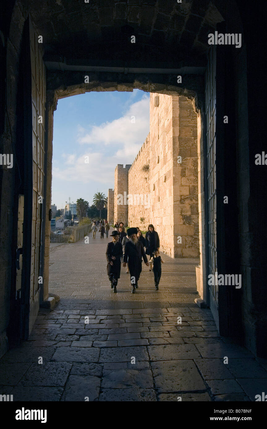 Ultra orthodox Jews walk through Jaffa gate or Bab al-Khalil Old city ...