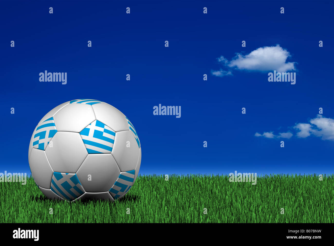 Greek soccer ball laying on the grass Stock Photo - Alamy