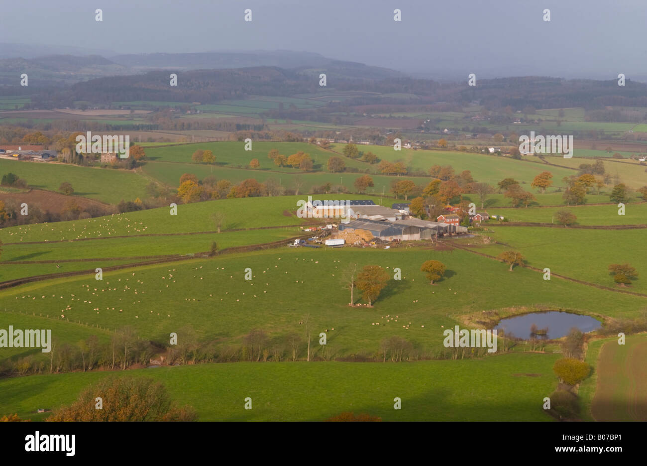 View over farmland from Cole's Tump a naturally formed mound on hill in ...