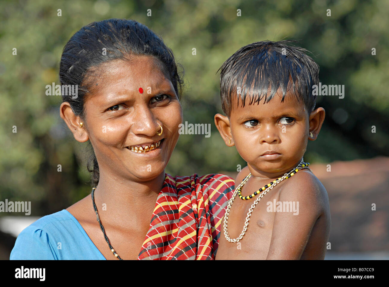 Mother and child. Bhil tribe Stock Photo - Alamy