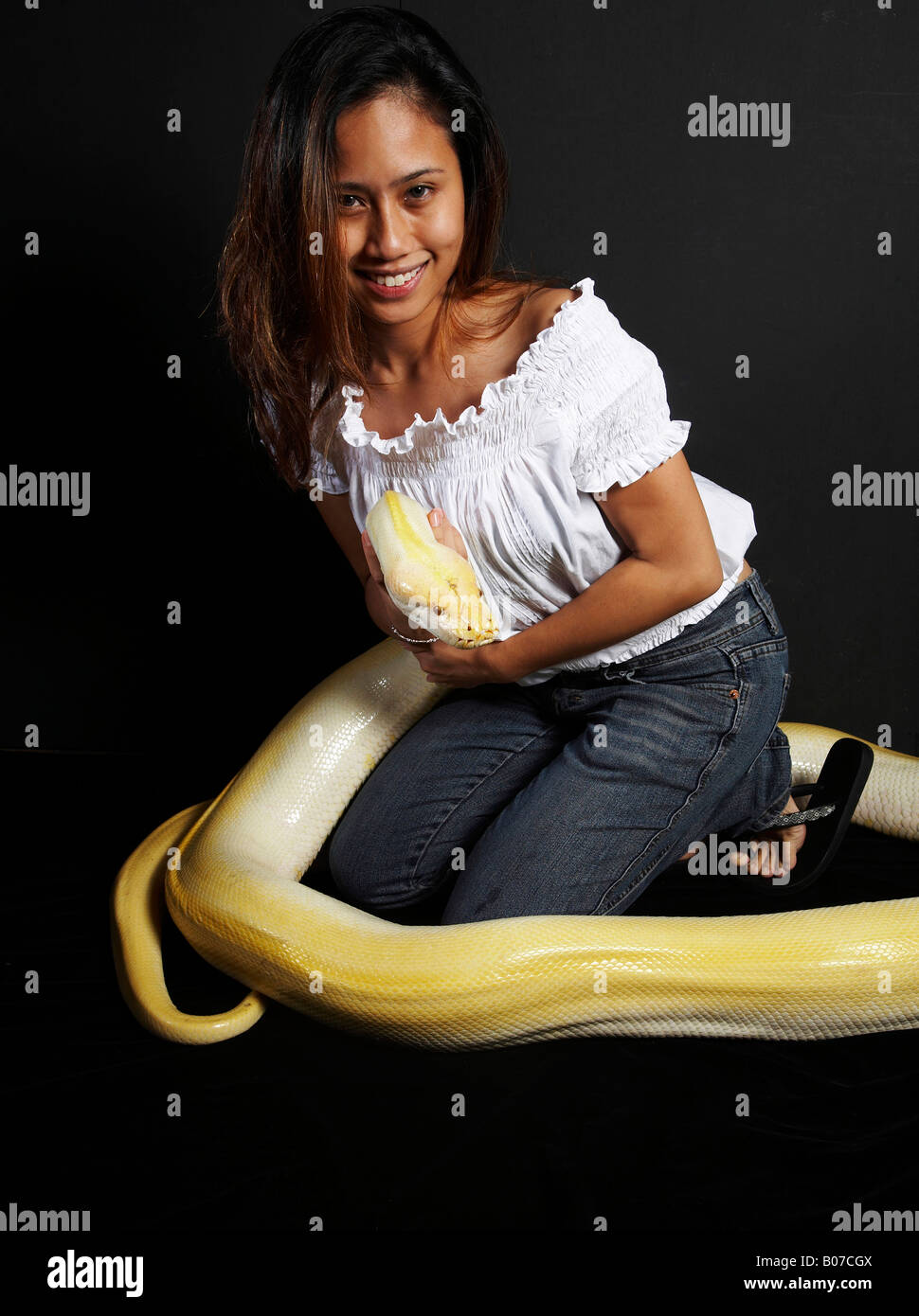 Girl with snake around her hi-res stock photography and images - Alamy