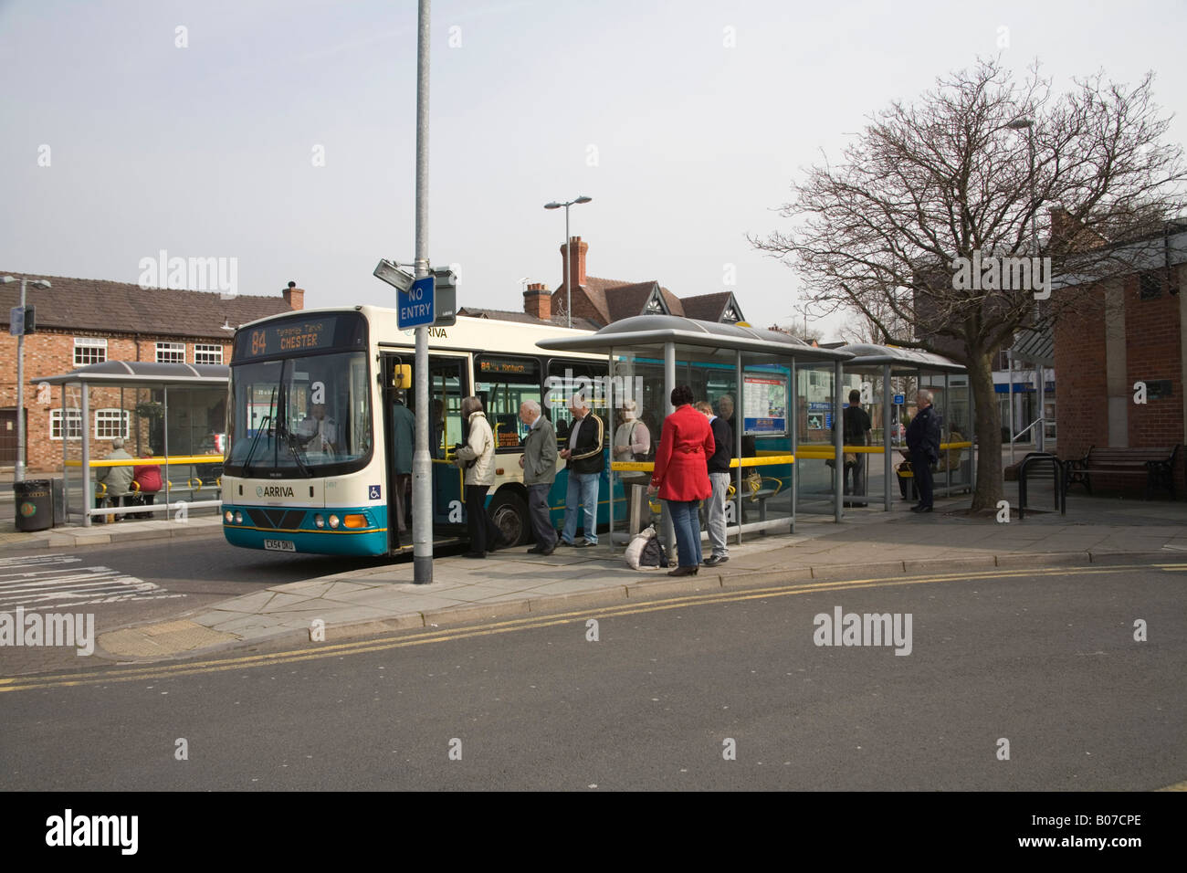Nantwich Cheshire England UK April Passengers queuing for a bus in the ...