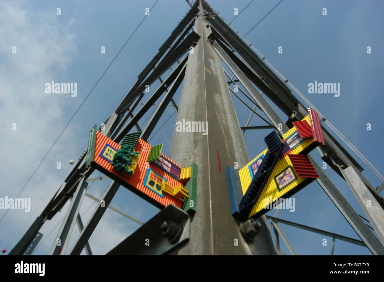 Pylon with houses Stock Photo - Alamy