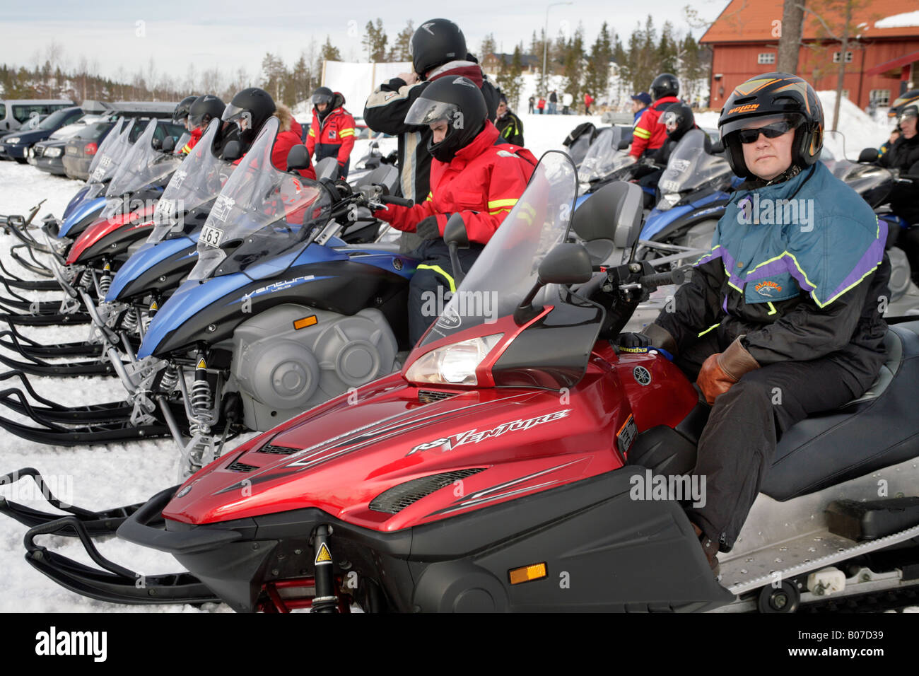 Tourist ride on snowmobiles hi-res stock photography and images - Alamy