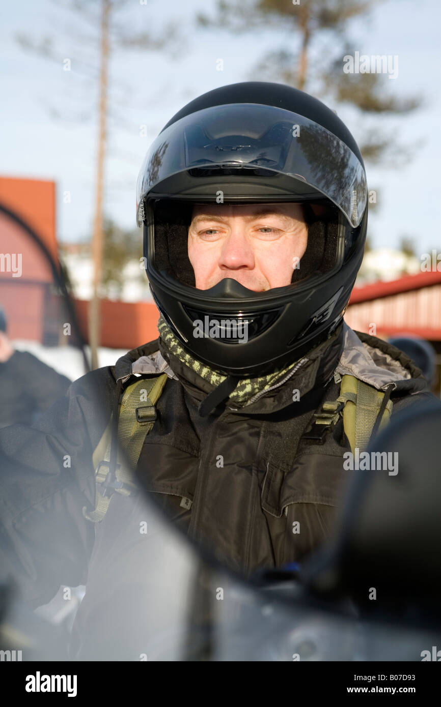 Adult male motorbike rider equipped with crash helmet Stock Photo - Alamy