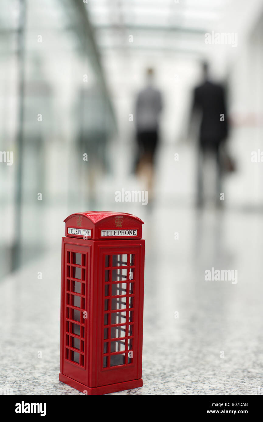 Small English phone box in an office building Stock Photo - Alamy