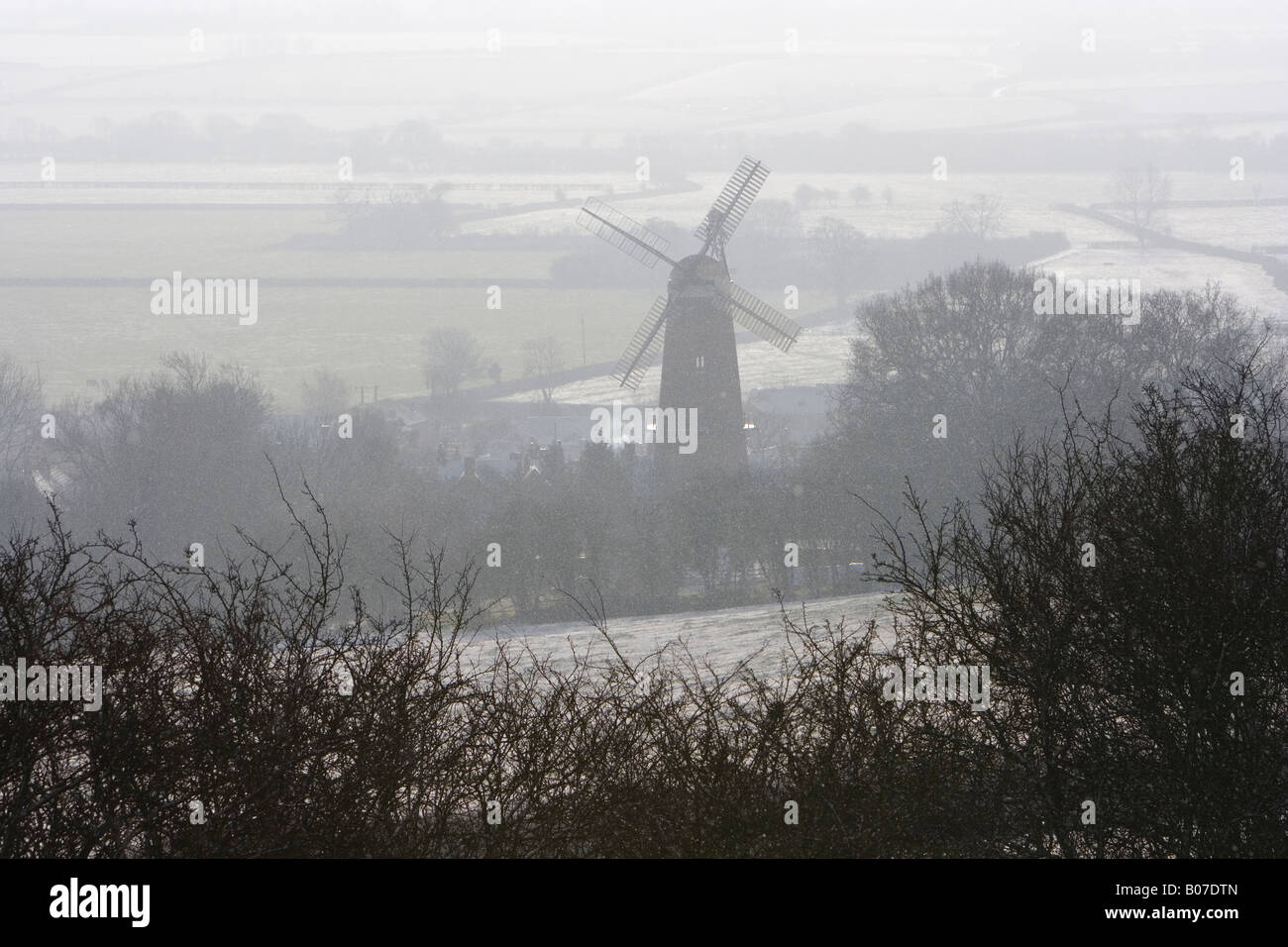 Quainton windmill in snowfall, Bucks, England Stock Photo - Alamy