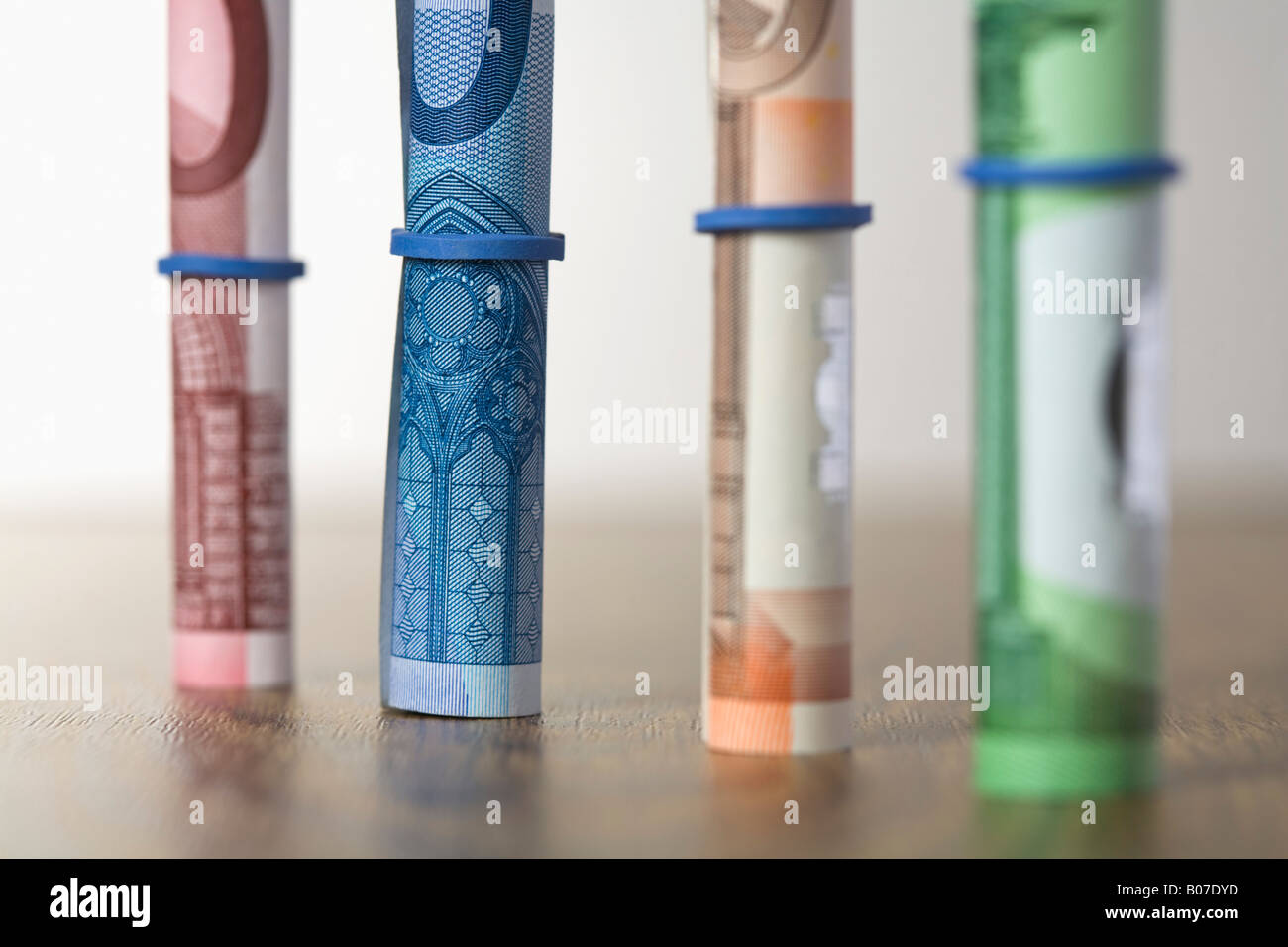 Rolled up bank notes Stock Photo - Alamy