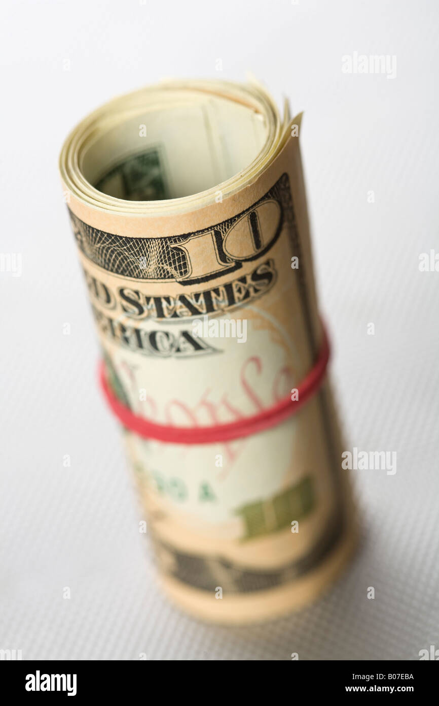 Rolled up dollar notes hi-res stock photography and images - Alamy