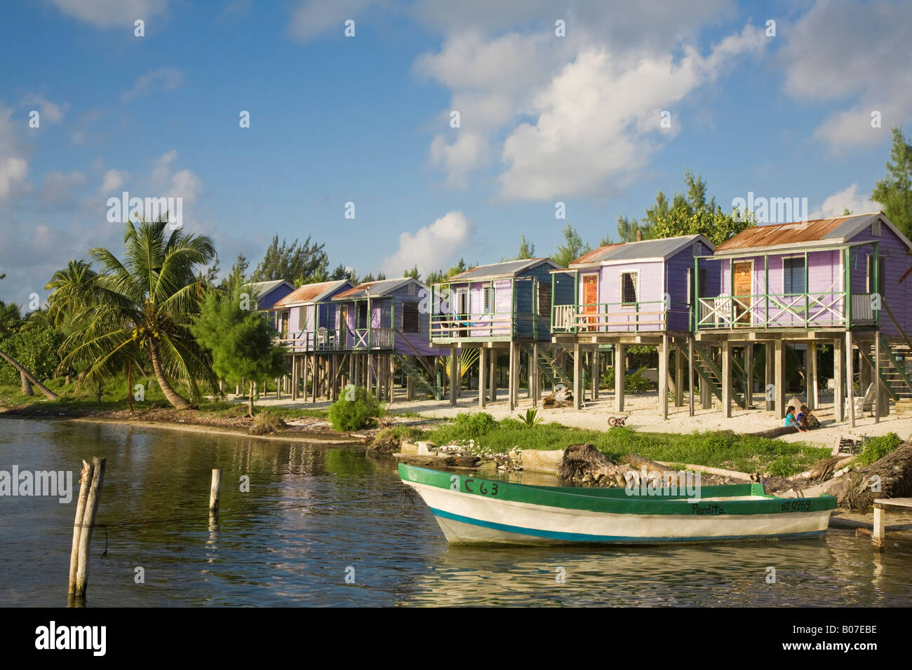 Belize, Caye Caulker, Wooden beach cabanas on stilts Stock Photo - Alamy