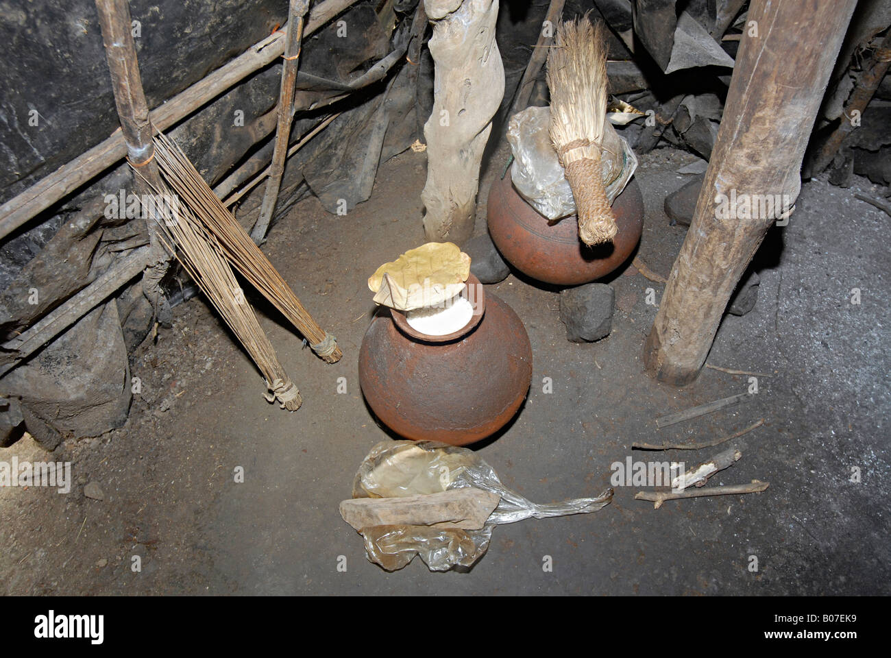 Salt preservation in a mud pot. Katkari tribe Stock Photo - Alamy