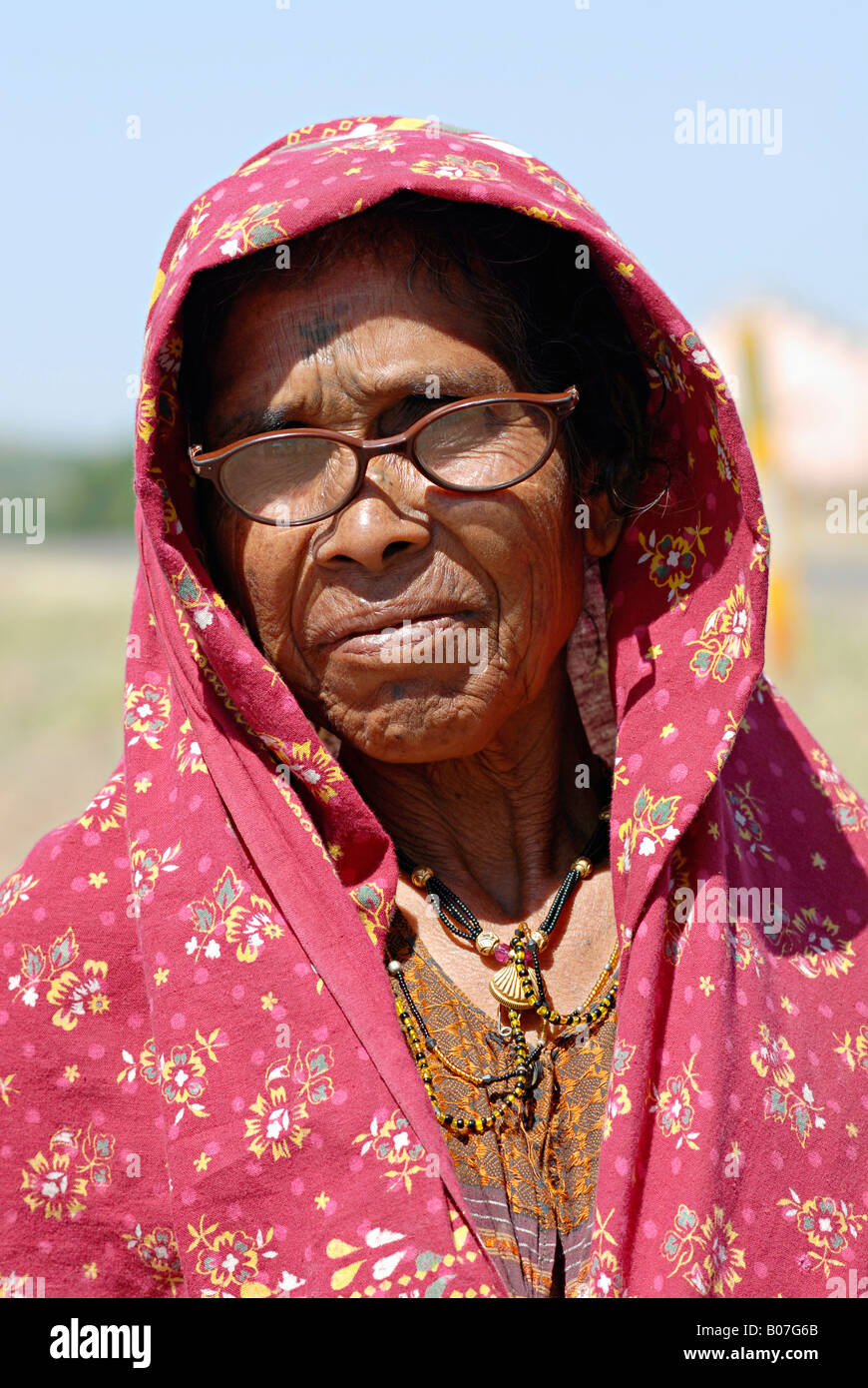Close-up of an old woman with spectacles. Kokna tribe. Rural faces of ...