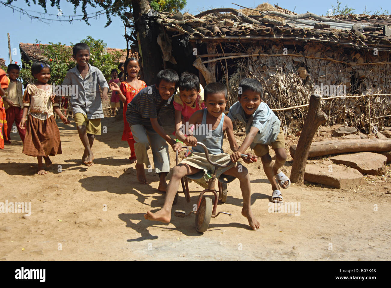 Kokna tribal children playing Stock Photo - Alamy