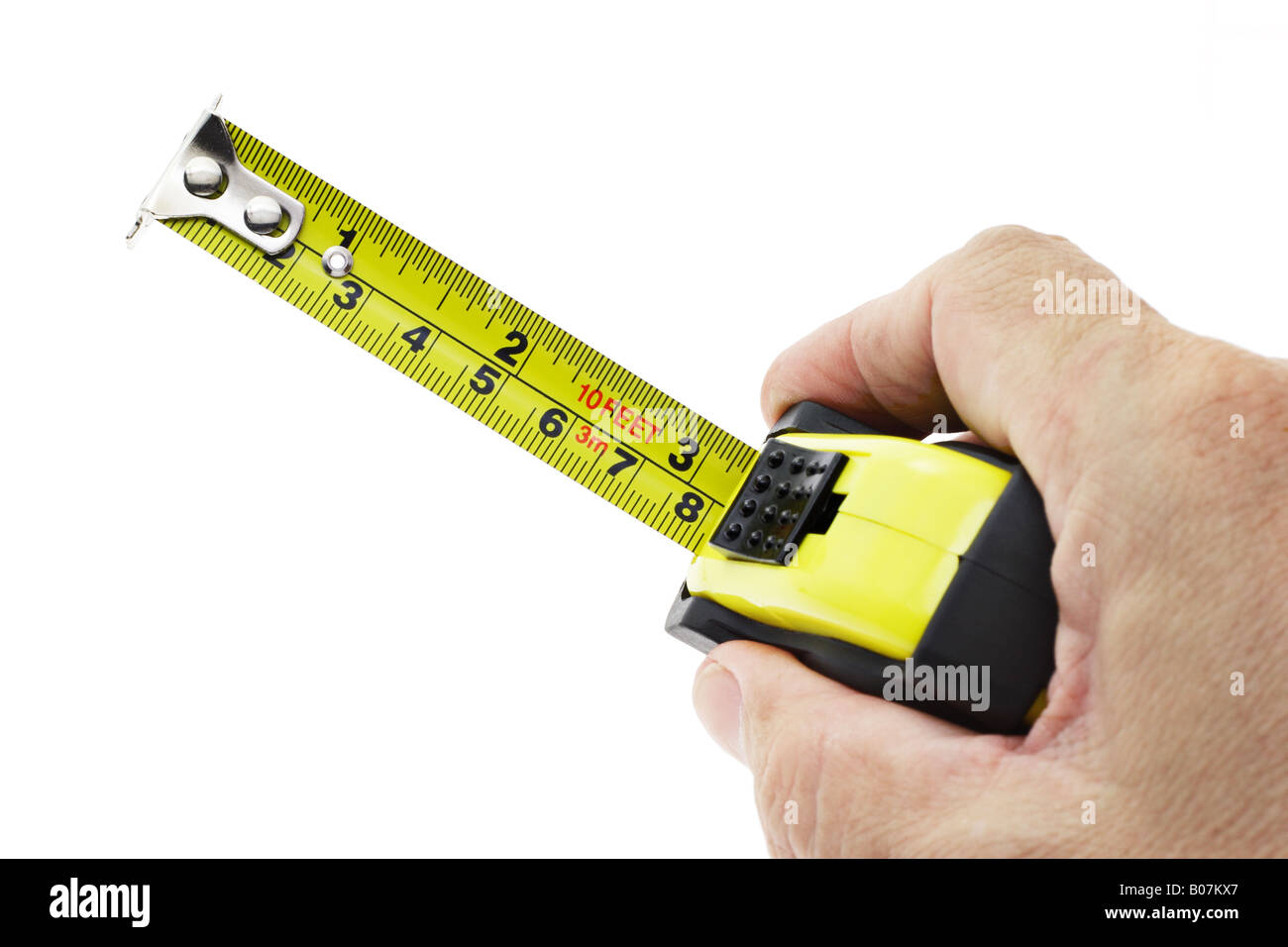 Hand holding measuring tape on white background Stock Photo - Alamy