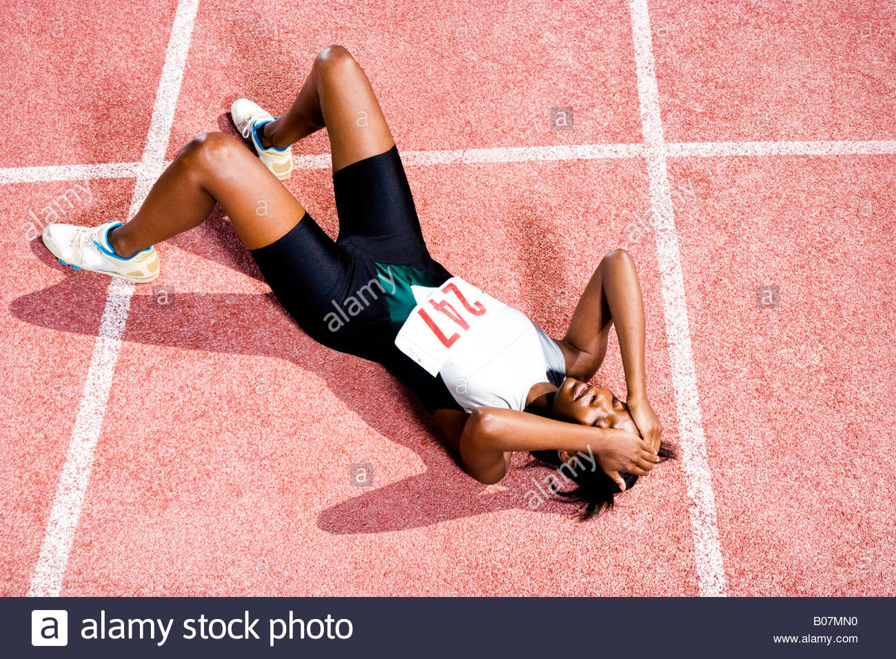 Exhausted Female Athlete Stock Photos & Exhausted Female Athlete Stock ...