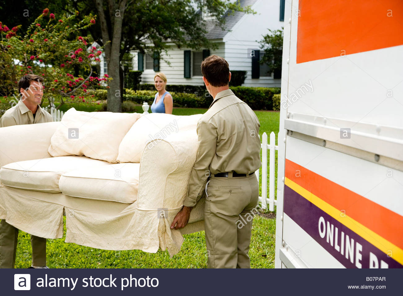 Removal Men Carrying Furniture Removal Stock Photos & Removal Men ...