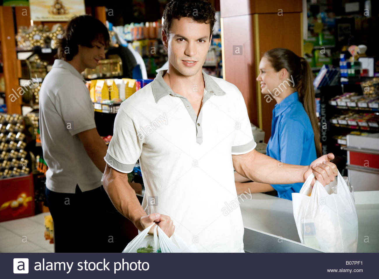 Man Supermarket Checkout Stock Photos & Man Supermarket Checkout Stock ...