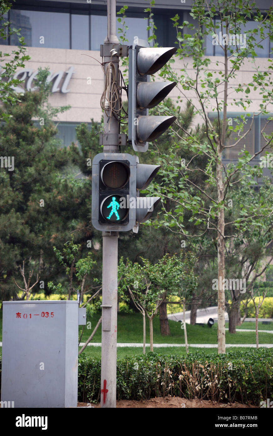 Traffic signals with pedastrian crossing at cross now China Asia ...