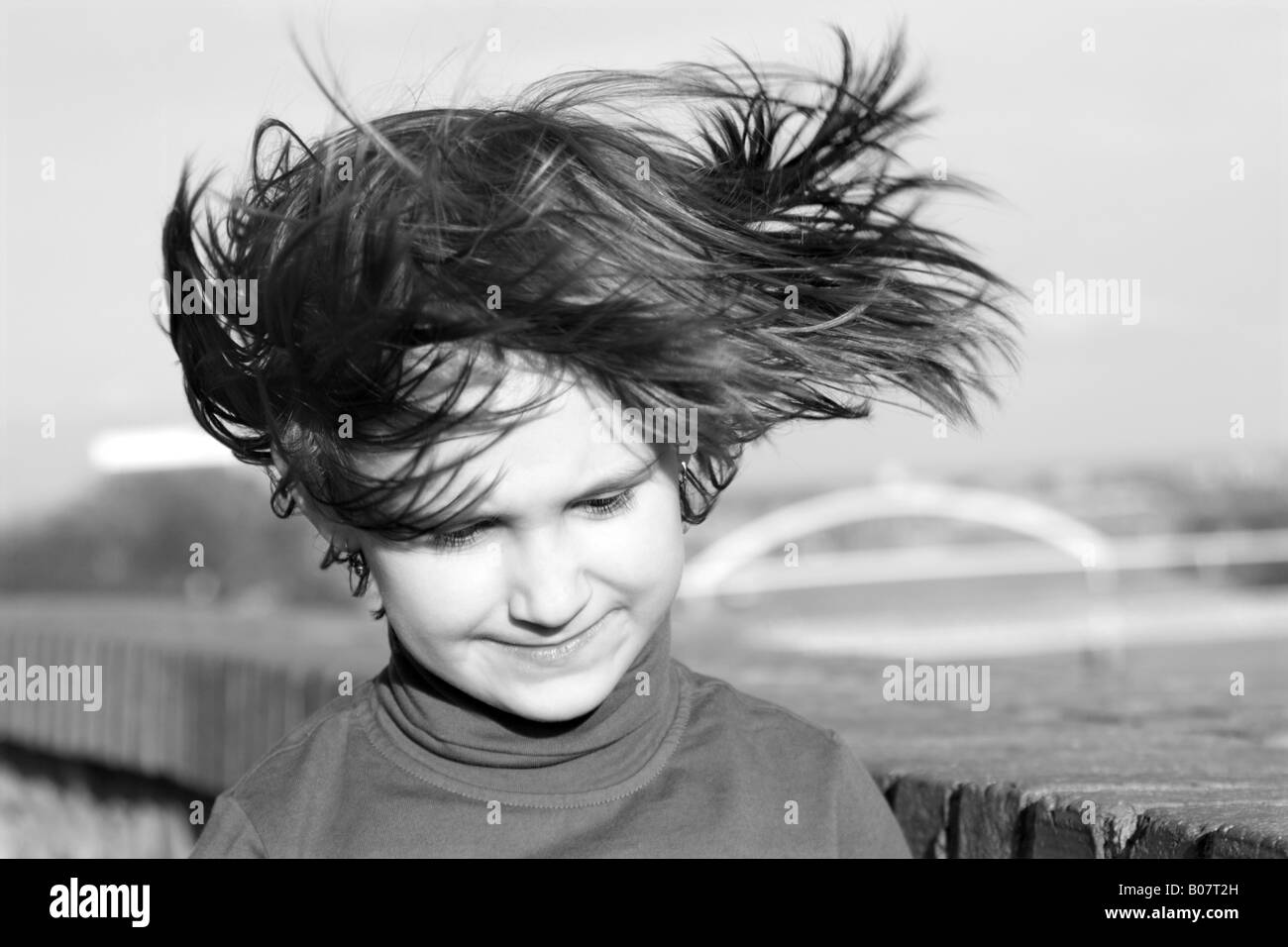 little girl in the wind Stock Photo - Alamy