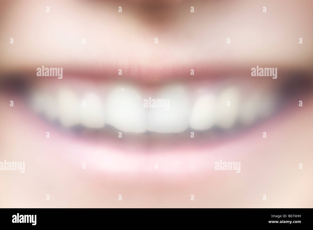 False smiles hi-res stock photography and images - Alamy