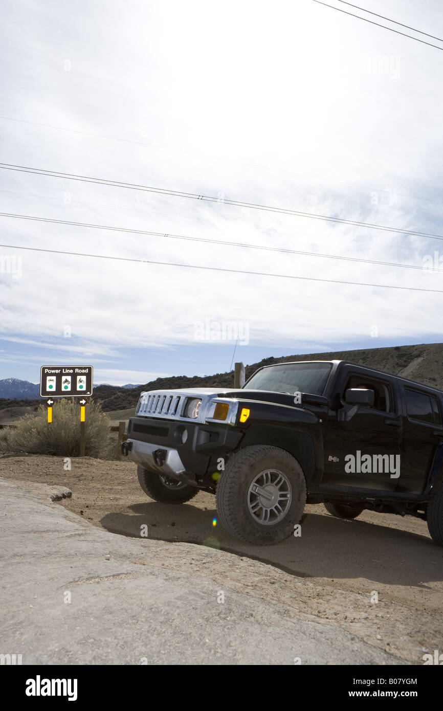 Hummer H3 being driven off-road in desert Stock Photo - Alamy