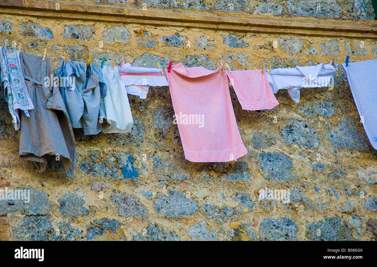 Clothes line hanging italy hi-res stock photography and images - Alamy