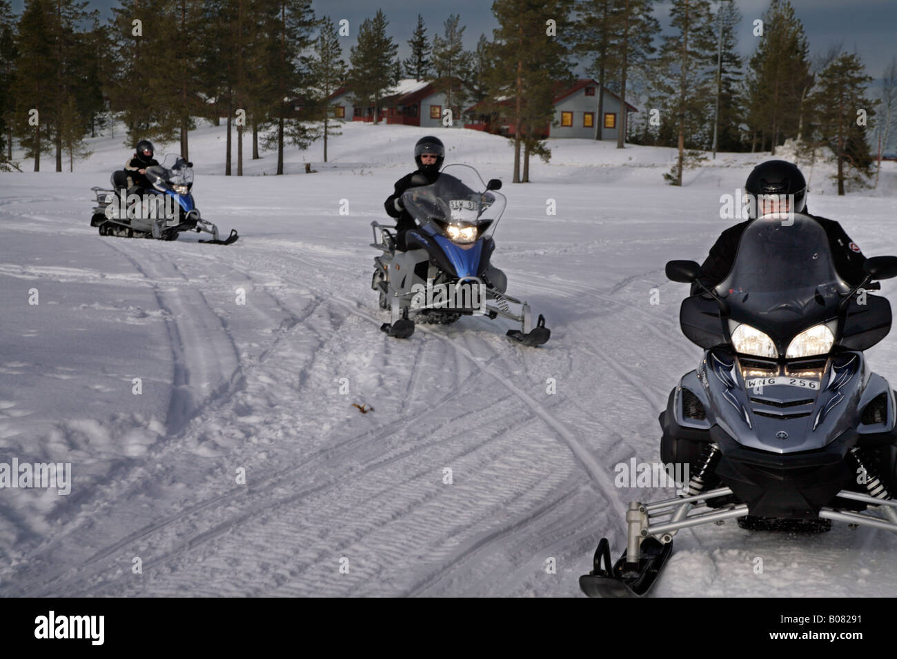 Snowmobiles in dusk The vehicle is an important mode of transport in ...
